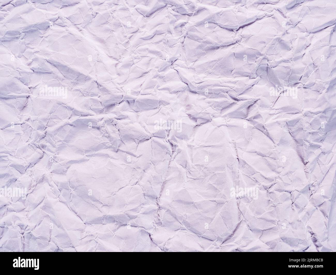 Сrumped paper as an abstract background with cold tint Stock Photo - Alamy