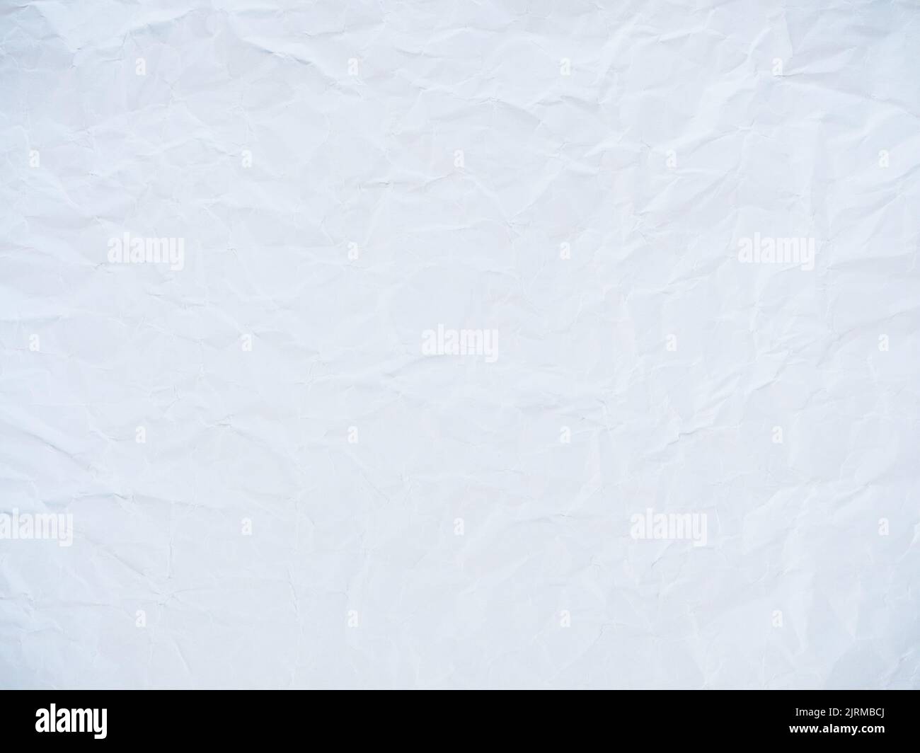Сrumpled paper with folds and creases as an abstract background Stock ...