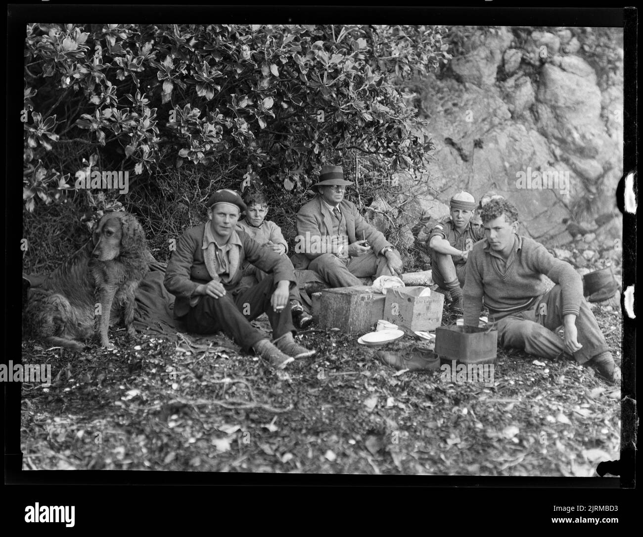 Group men relaxing in Black and White Stock Photos & Images - Alamy