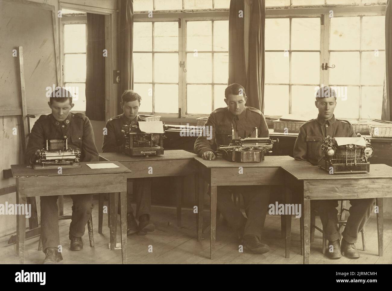 Seated at their typewriters hi-res stock photography and images - Alamy