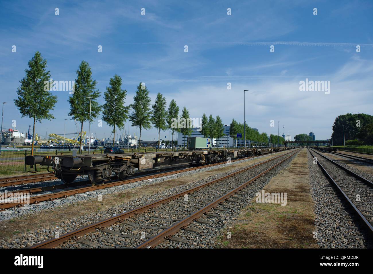 Rotterdam, The Netherlands. Low angle view of long line of freight ...