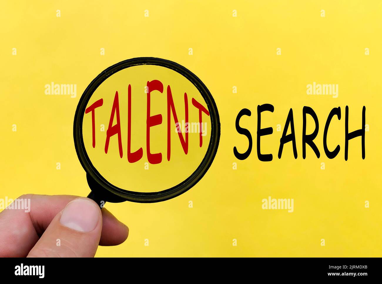Talent search on magnifying glass with yellow background. Talent search ...