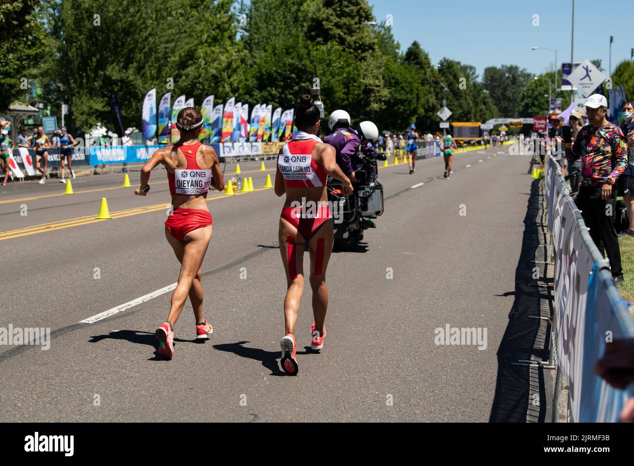 Kimberly Garcia Leon of Peru and Shijie Qieyang of China competing in ...
