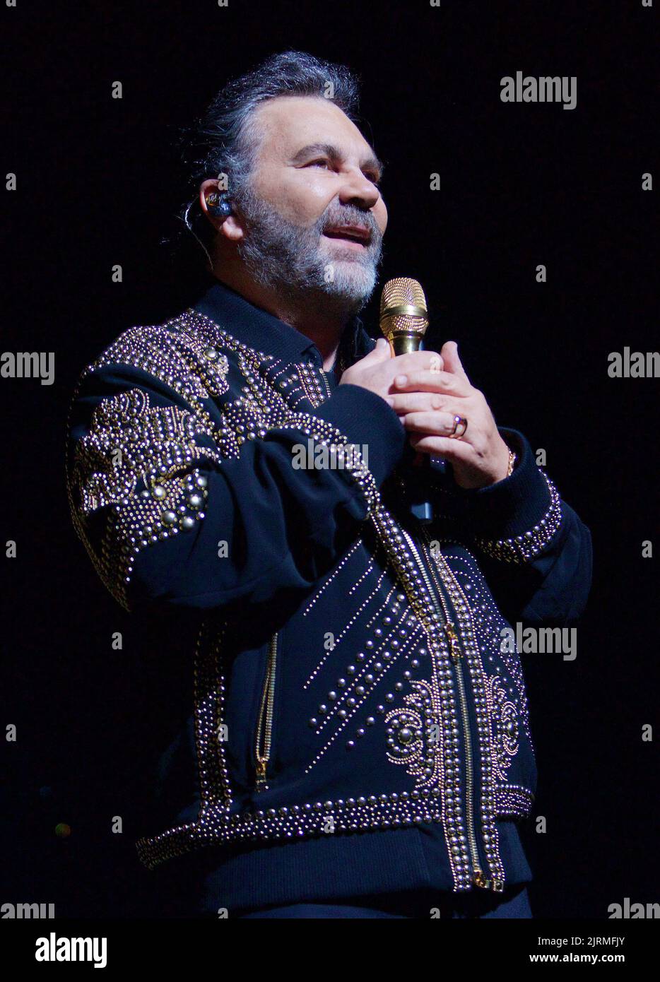 HOLLYWOOD, FL - AUG 24: Singer Mijares performs during a concert as ...
