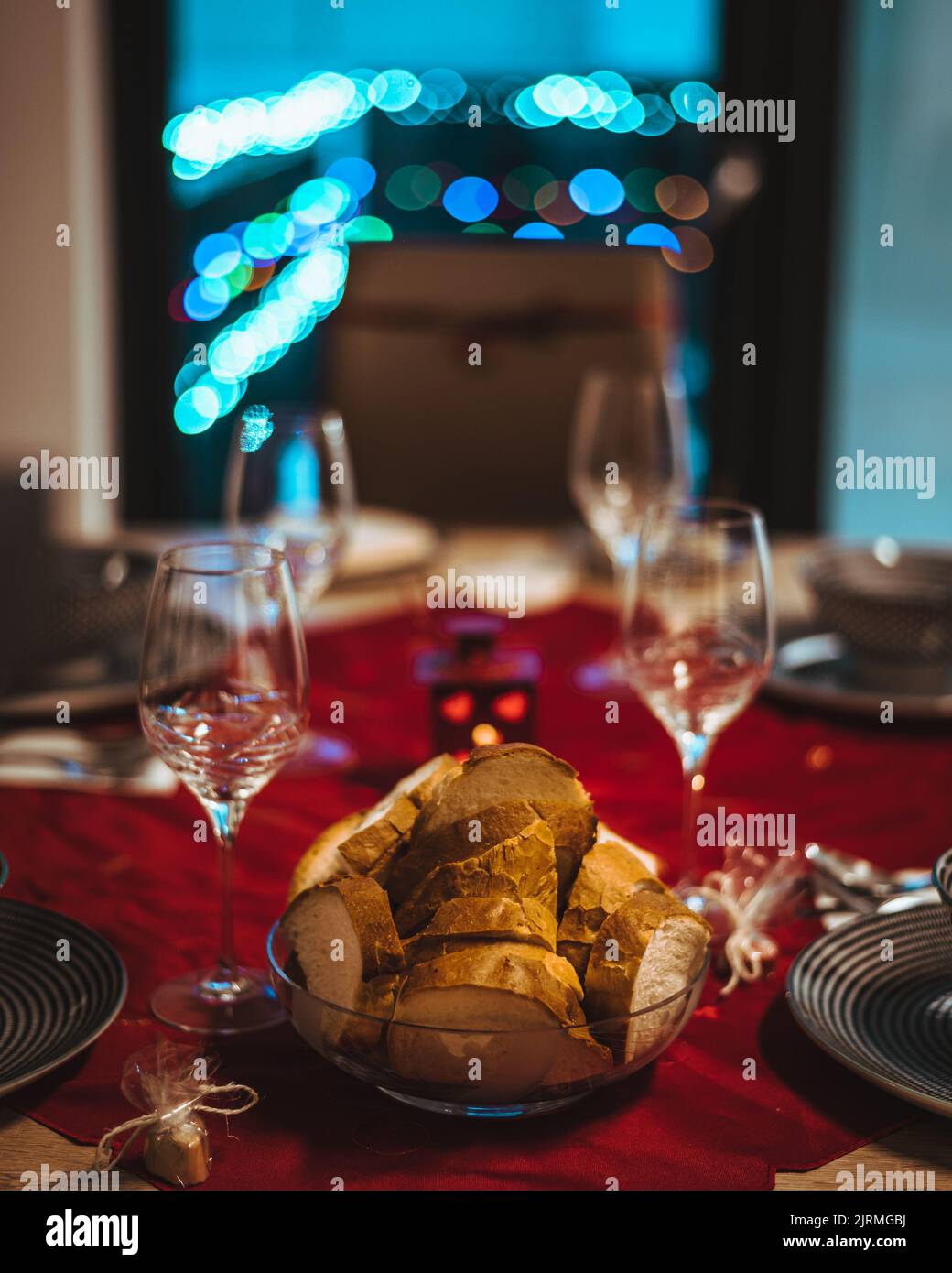 The vertical view of a family Christmas dinner table simple setting ...