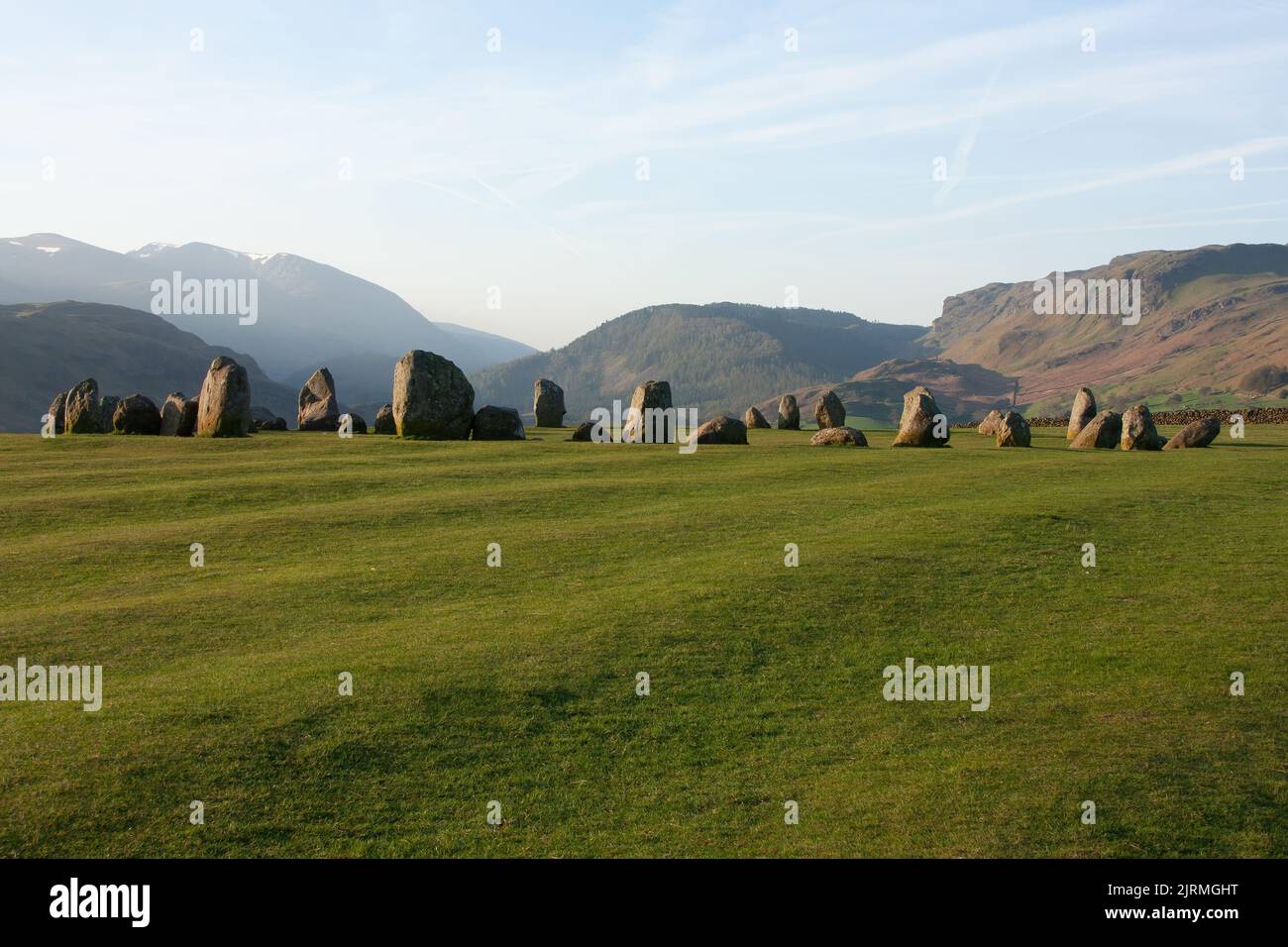 The view of megalithic Castlerigg stone circle in the green field under ...