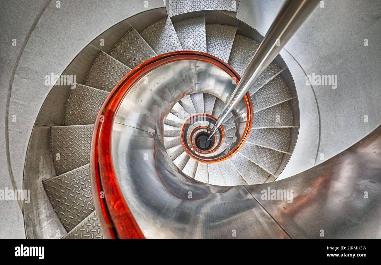 Historic circular staircase inside the Old Lighthouse of Ponta dos ...