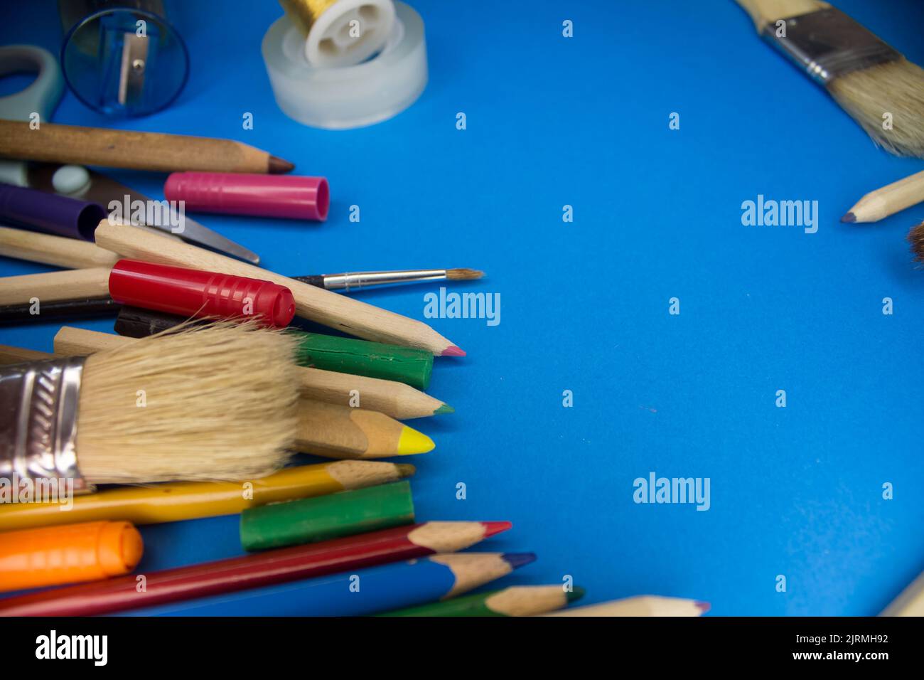 Overhead shot of school supplies, brushes, pencils, artistic tools. Art ...