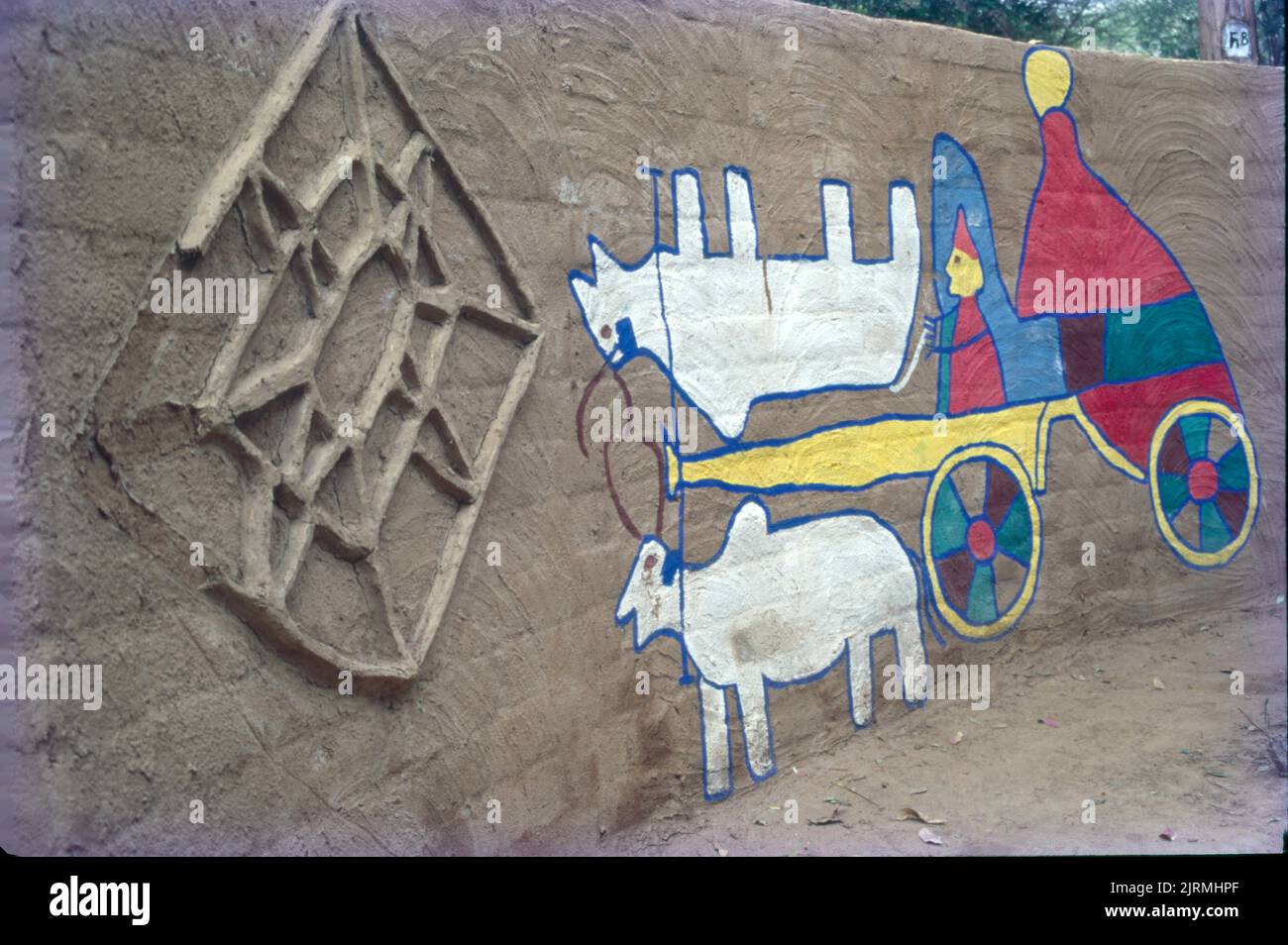Design decoration on the walls of Mud House in India Stock Photo - Alamy