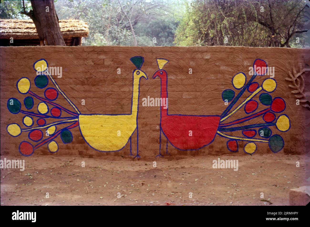 Traditional painting on the walls of Mud House in India Stock Photo - Alamy