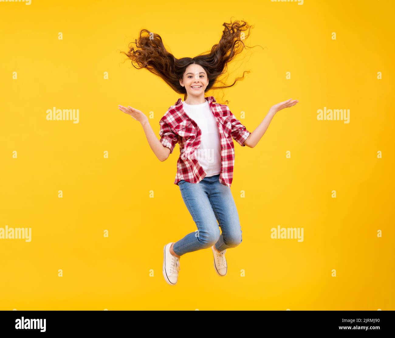Teenager face with crazy movement hair. Happiness, freedom, motion and ...