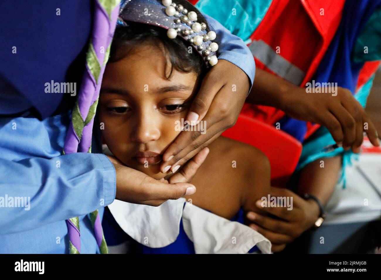 Dhaka, Bangladesh - August 25, 2022: A child gets his first dose of the ...