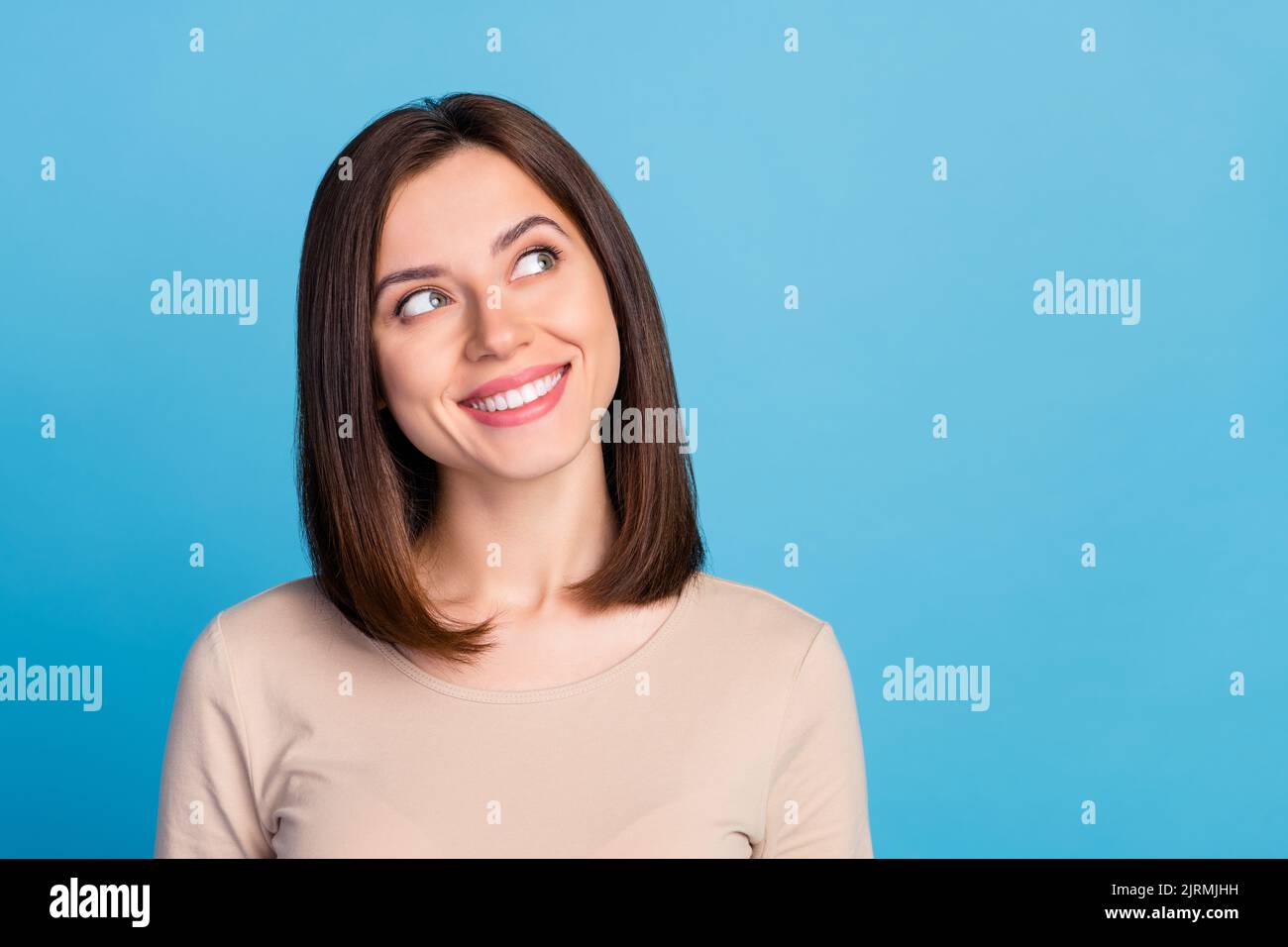 Portrait of pretty positive person beaming smile look interested empty ...