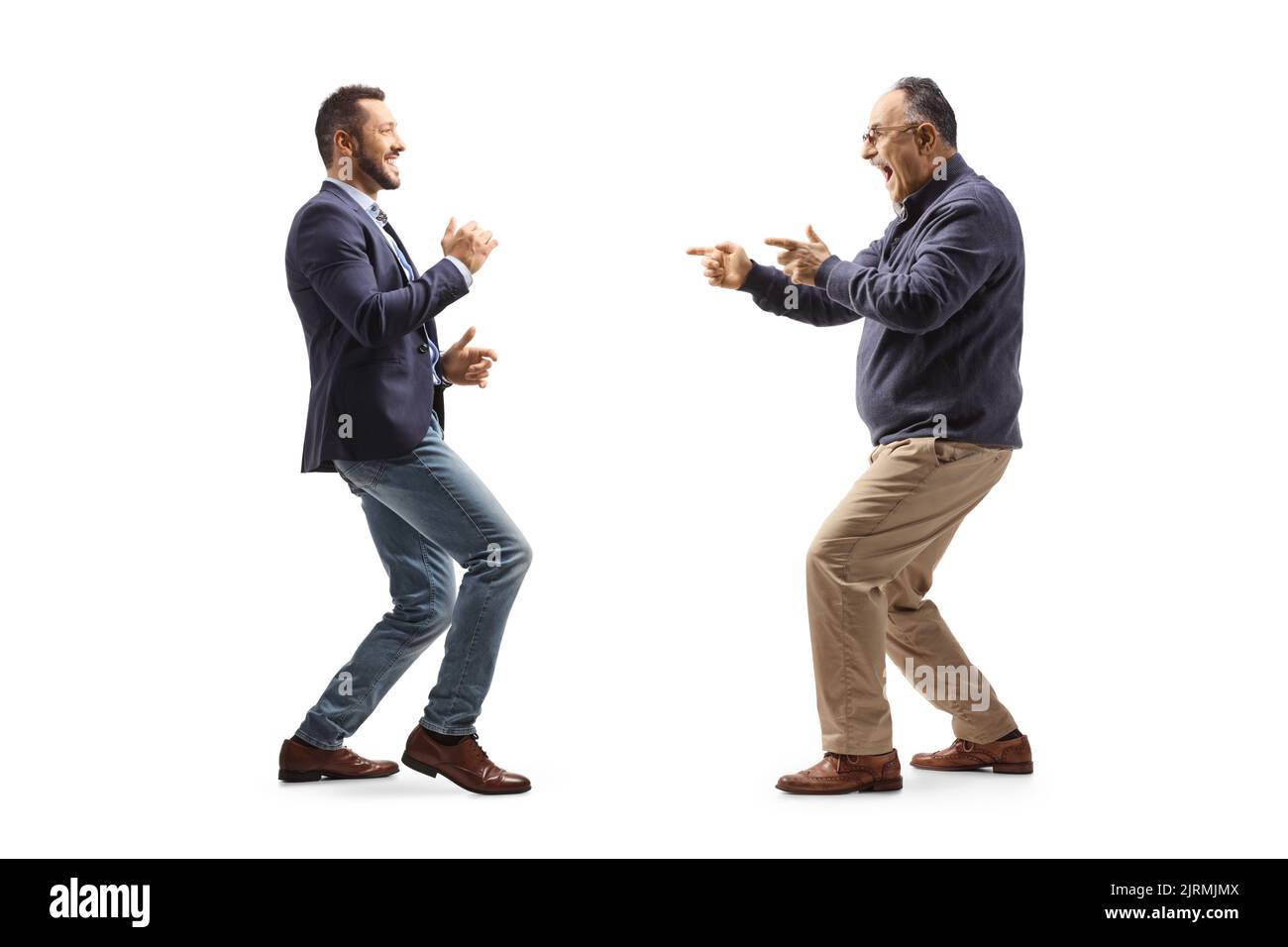 Full length profile shot of a young professional man dancing with a ...