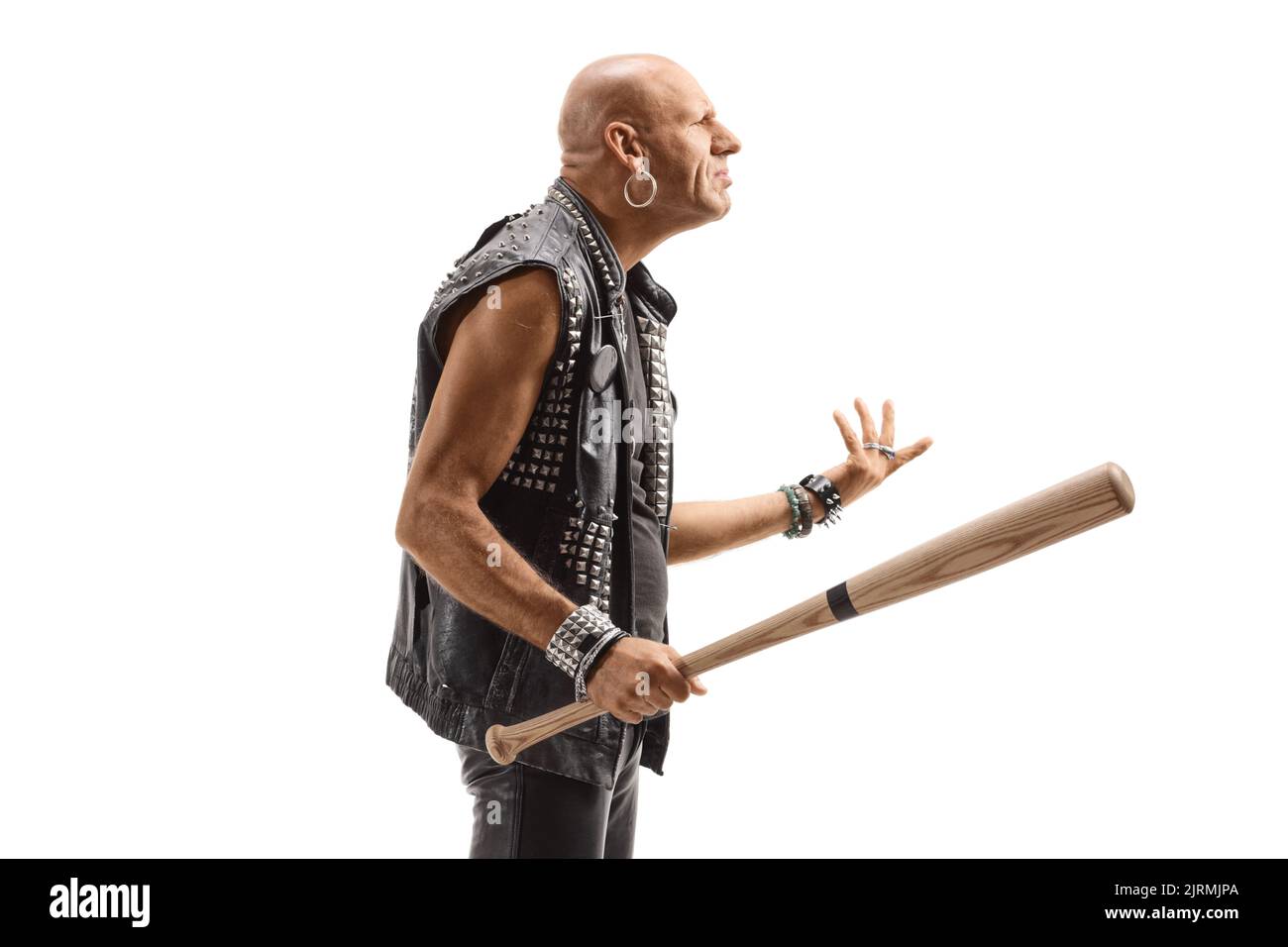 Profile shot of a bald man with a bat having a quarrel isolated on ...
