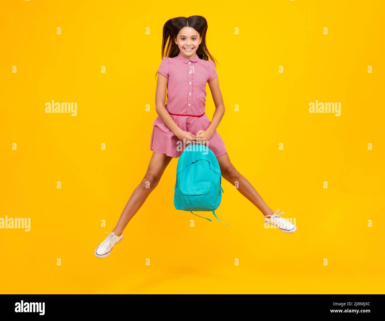 Schoolgirl with backpack. Teenager student, isolated background ...