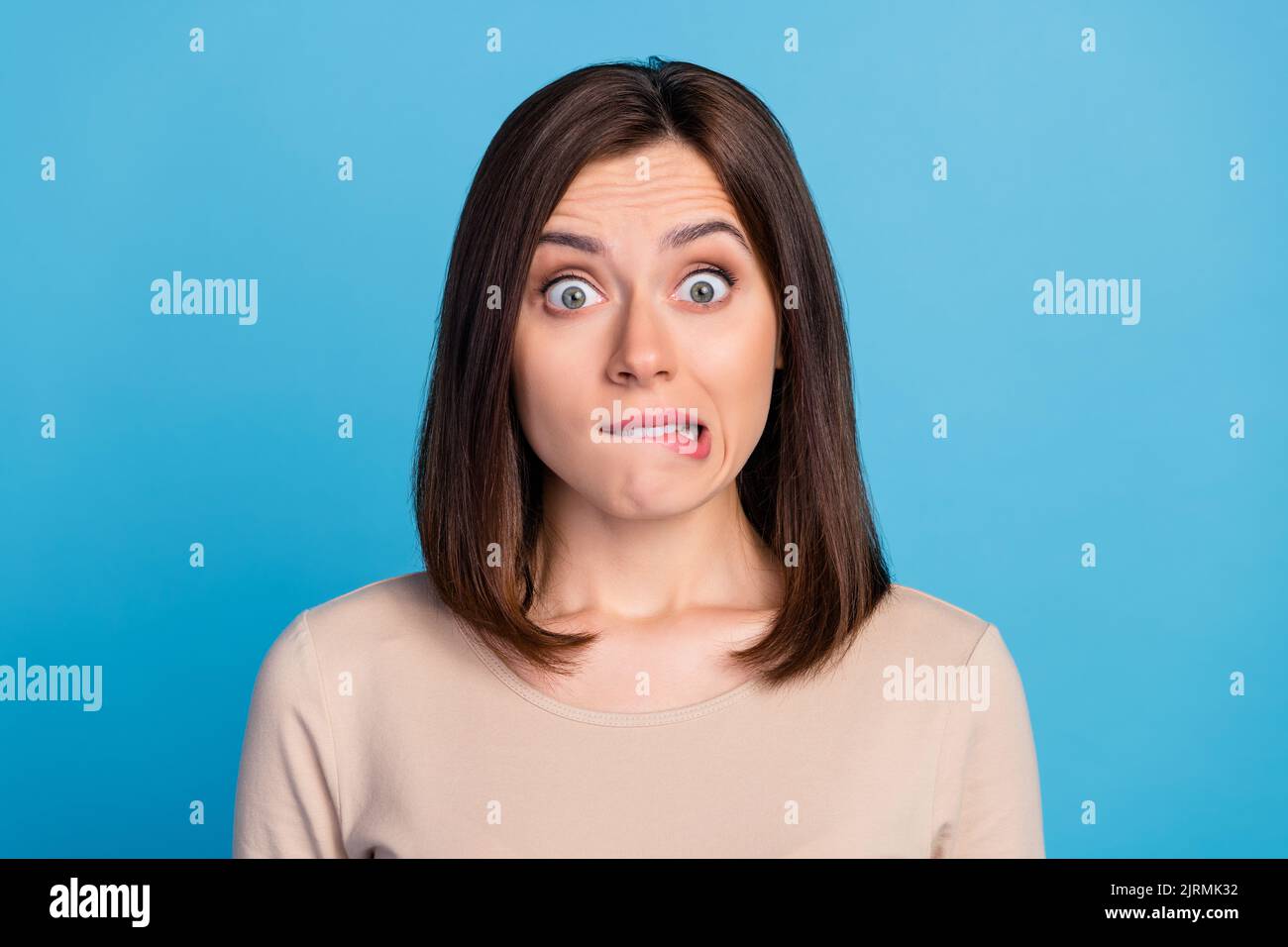 Biting lip anxious hi-res stock photography and images - Alamy