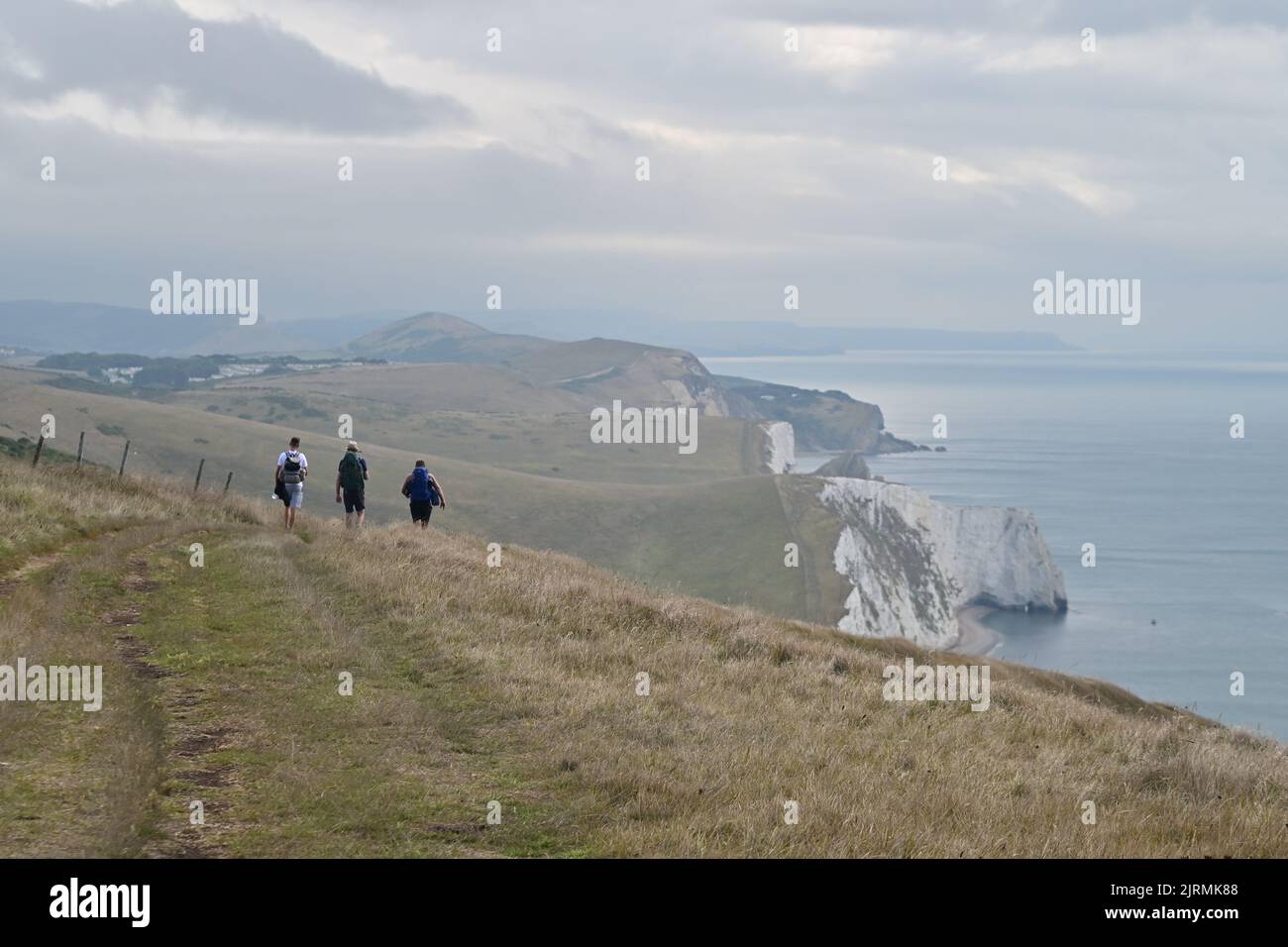 Dorset, UK, 25th August 2022, Weather. Ramblers walking on the Jurassic ...