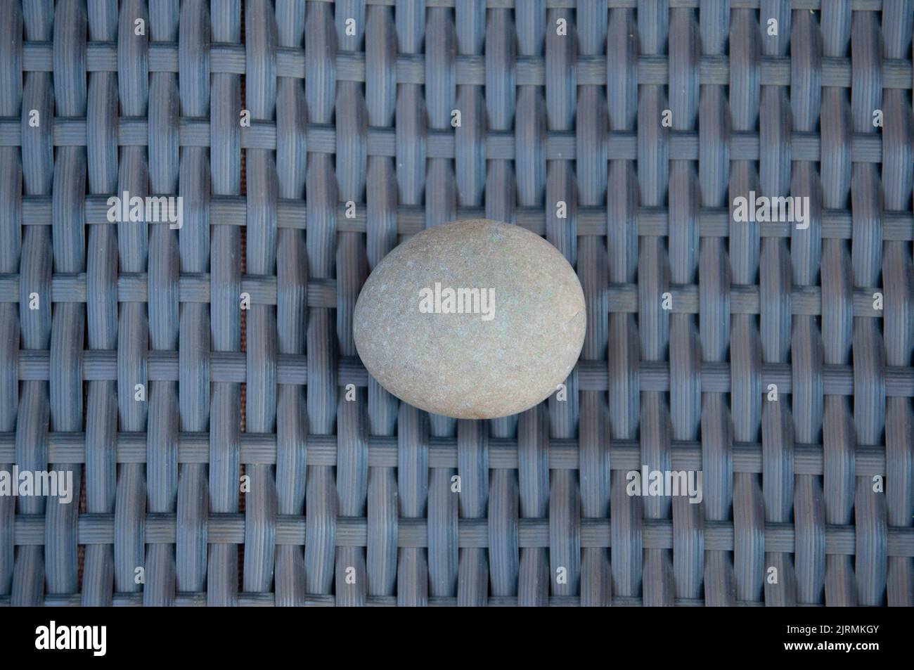 The cold color stone above of detailed natural intertwined wicker Stock ...