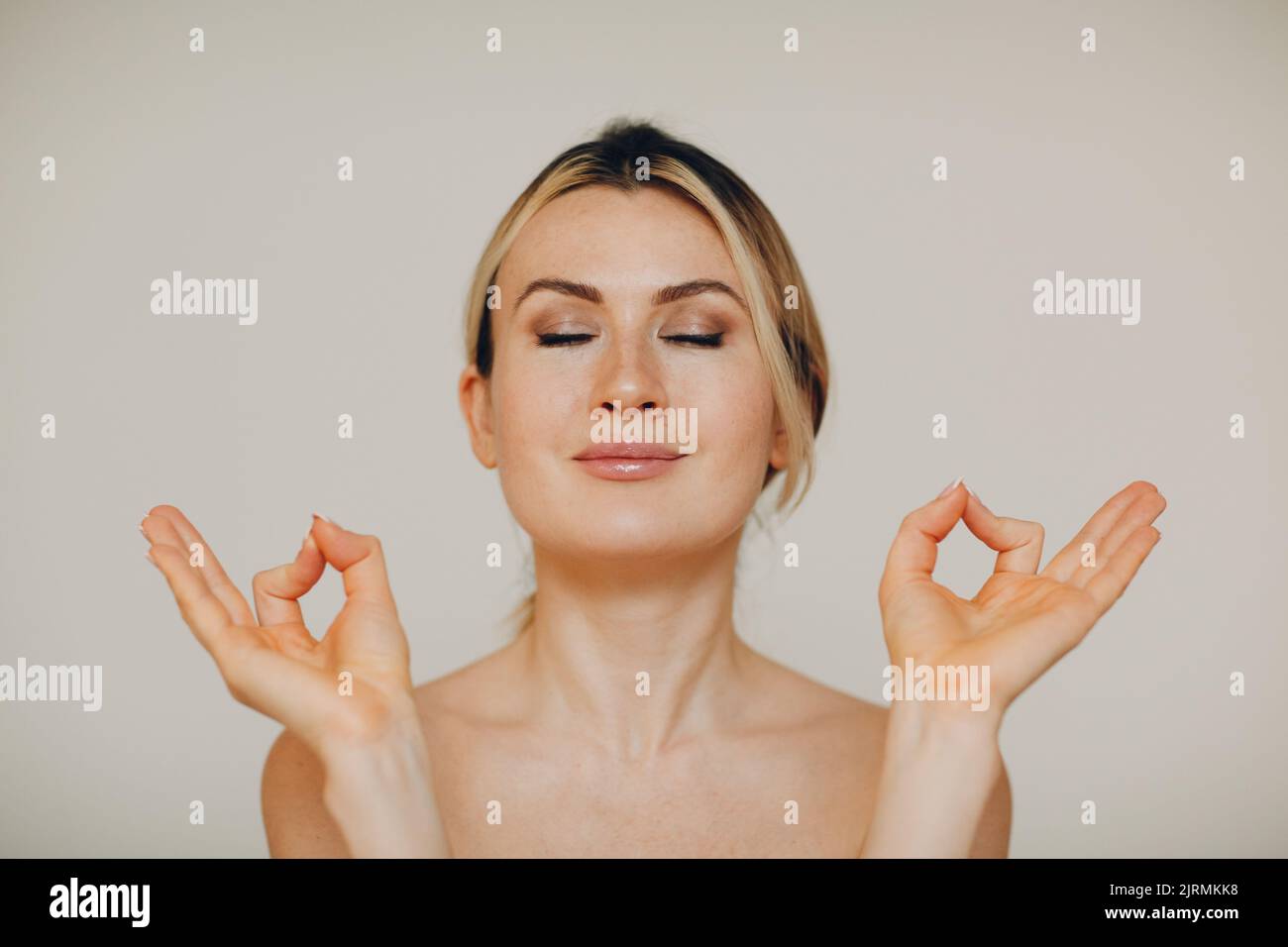 Inner peace and yoga, zen, meditation concept. Smiling young adult ...