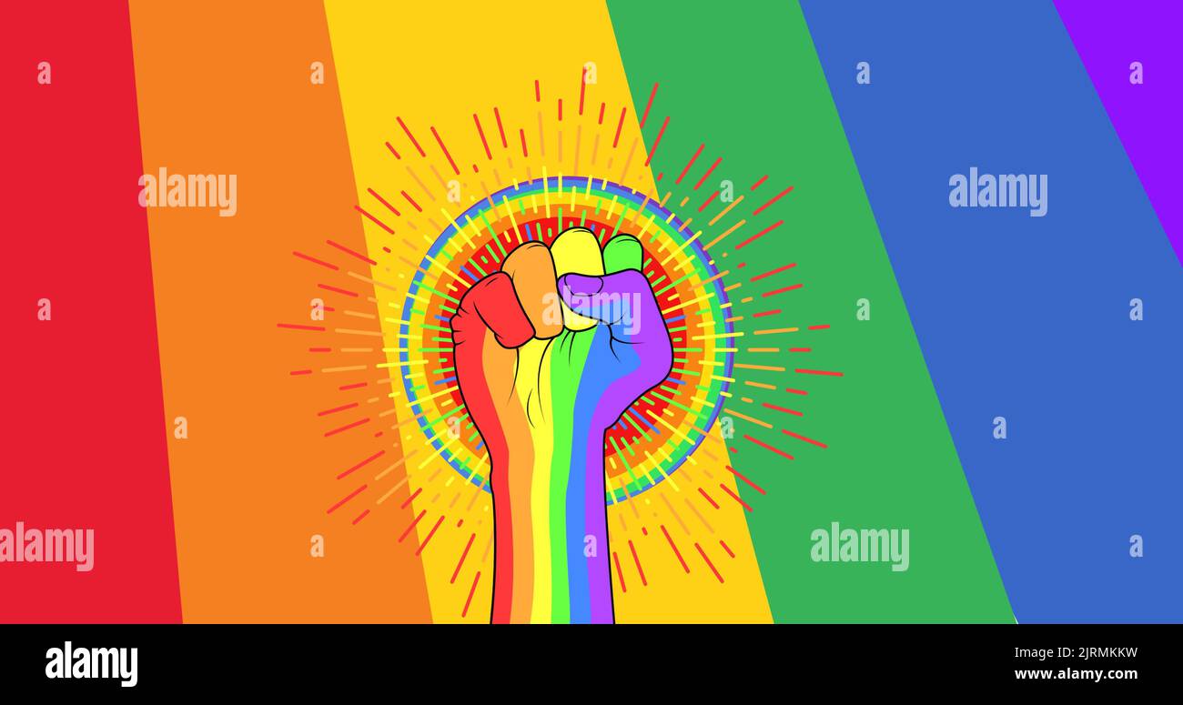 Multi colored hand showing fist over rainbow flag Stock Photo - Alamy