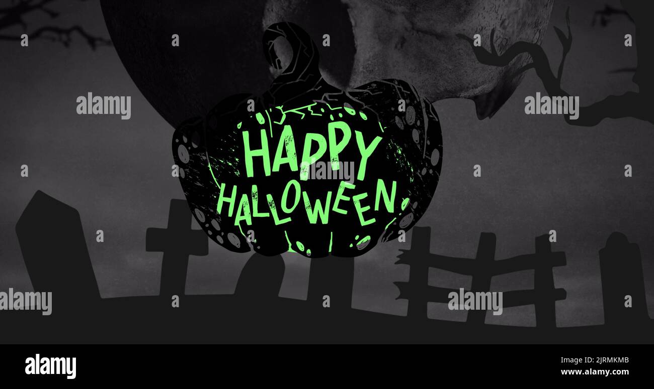 Digital composite image of happy halloween text in spooky cemetery at ...