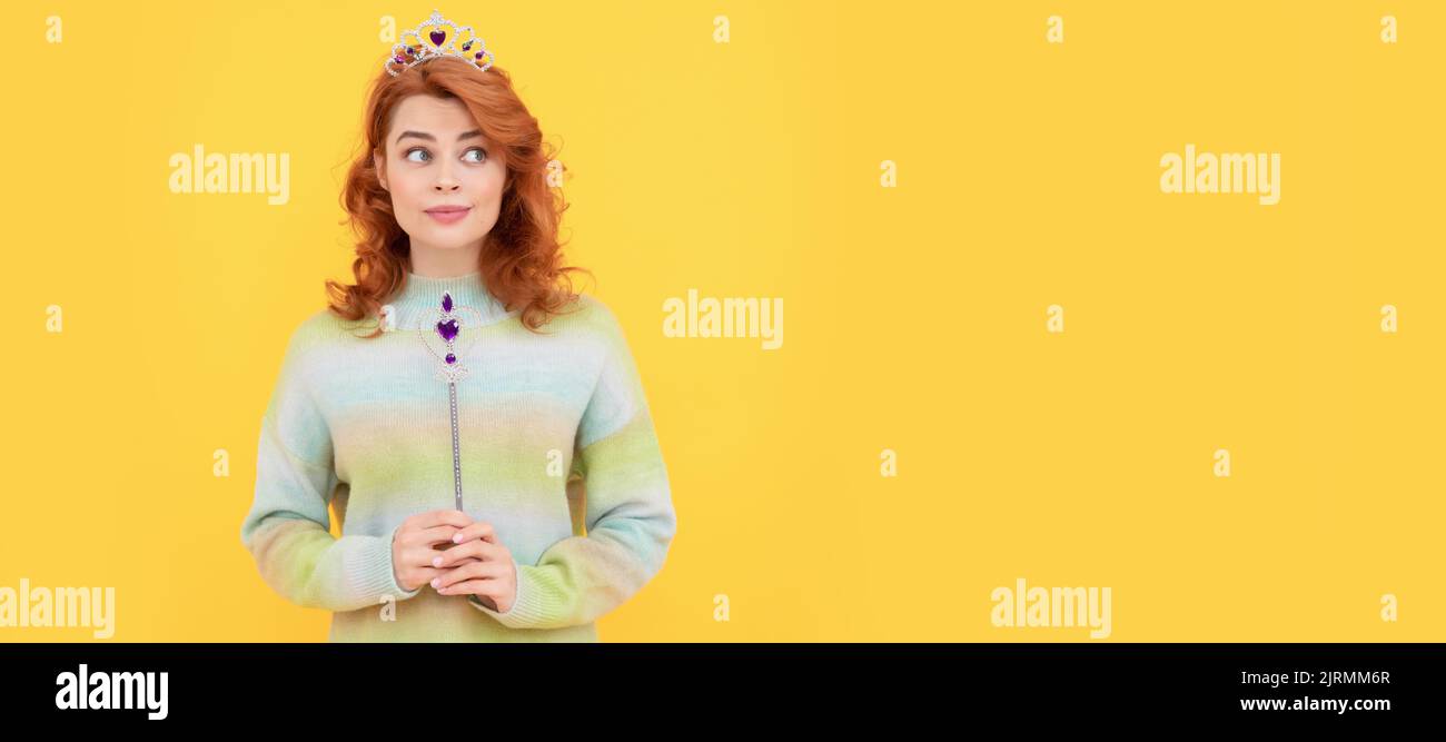 surprised redhead woman in queen crown with magic wand, magic. Woman ...