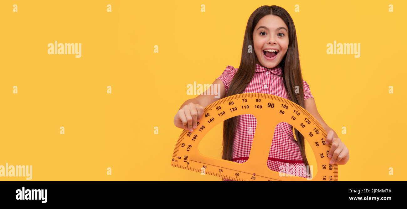 education for child. mathematics. amazed teen girl hold protractor ...