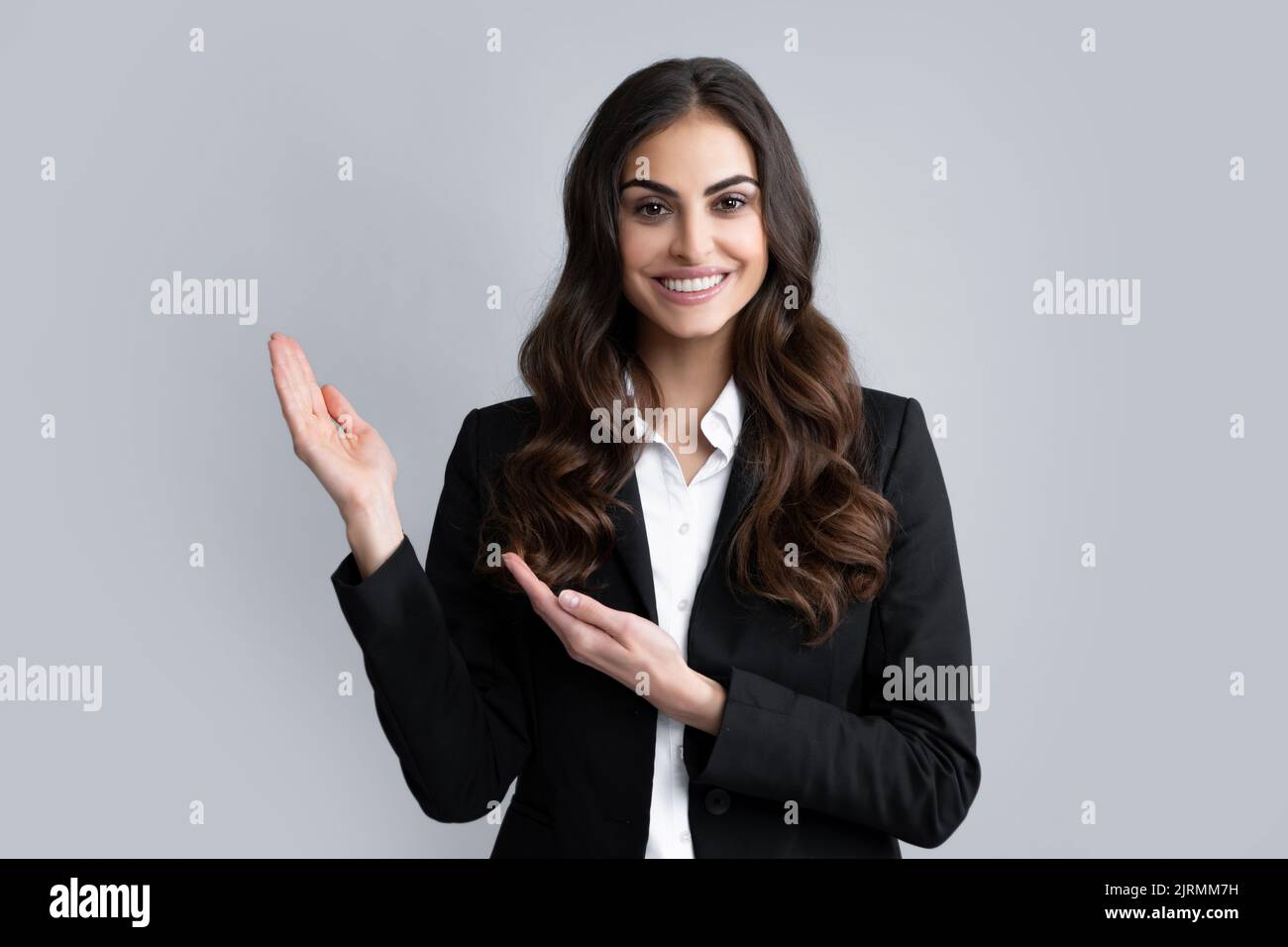 Woman point at copy space, showing copyspace pointing. Promo, girl ...