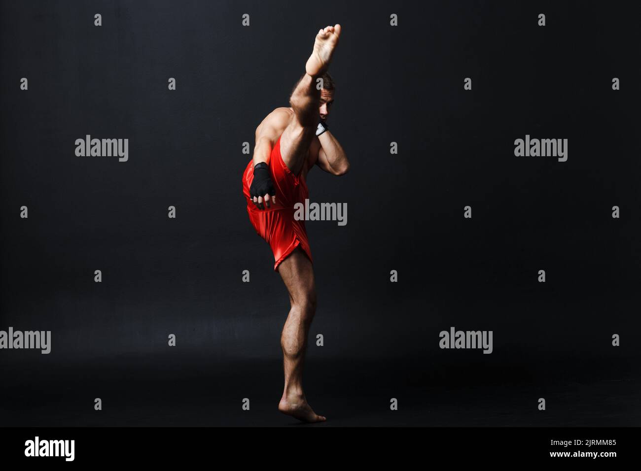 Sportsman muay thai man boxer stance at black background Stock Photo ...