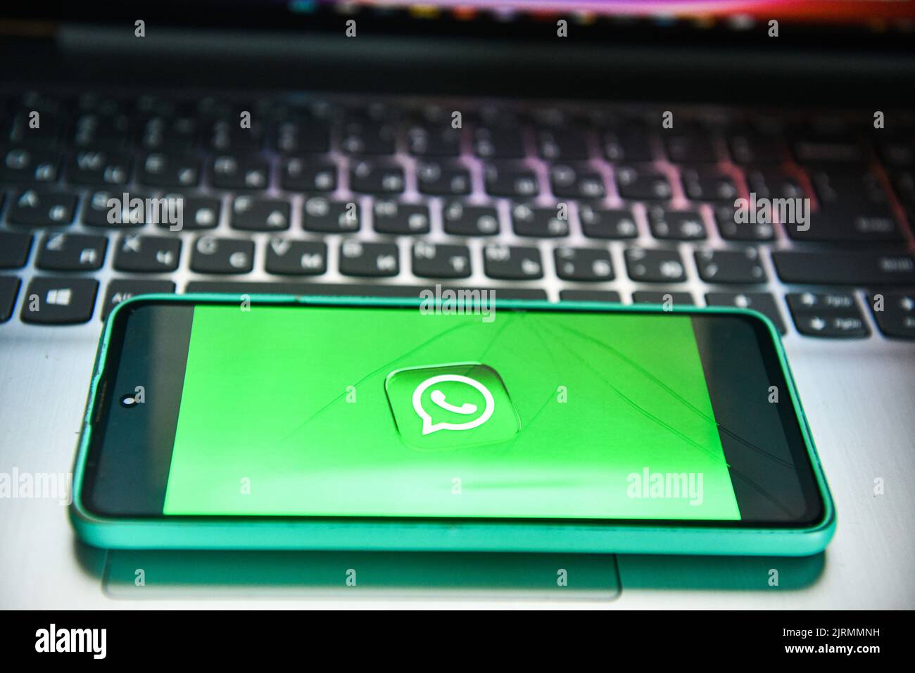 In this photo illustration, the WhatsApp logo is seen displayed on a ...