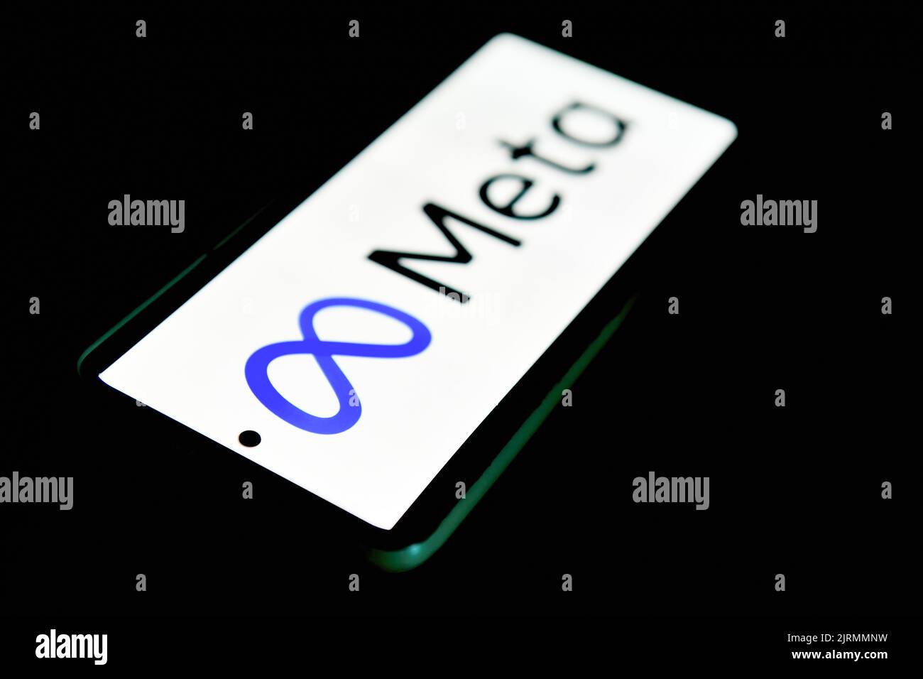 In this photo illustration, a Meta logo is displayed on the smartphone ...