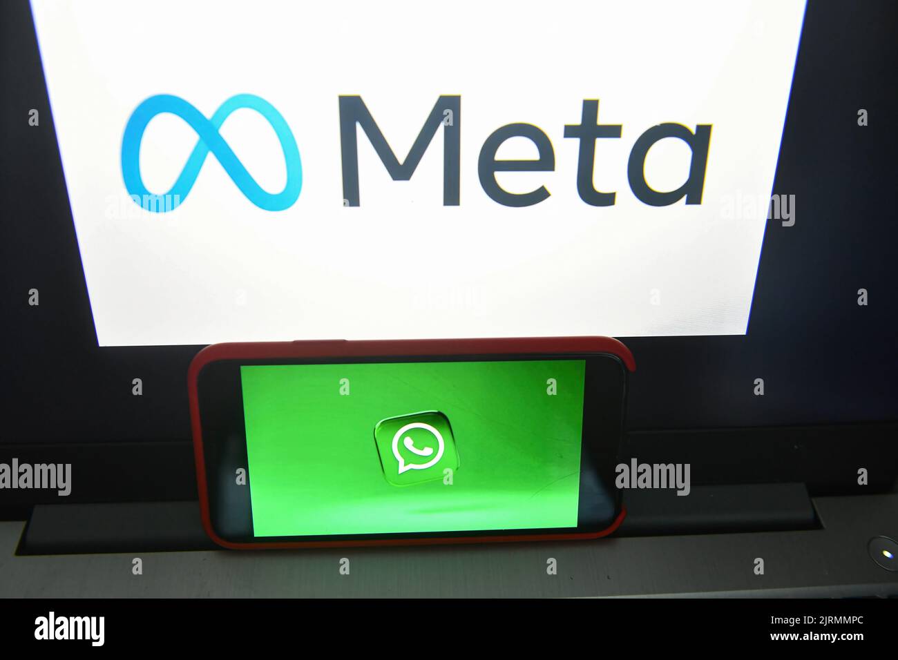 In this photo illustration, the WhatsApp logo is seen displayed on a ...