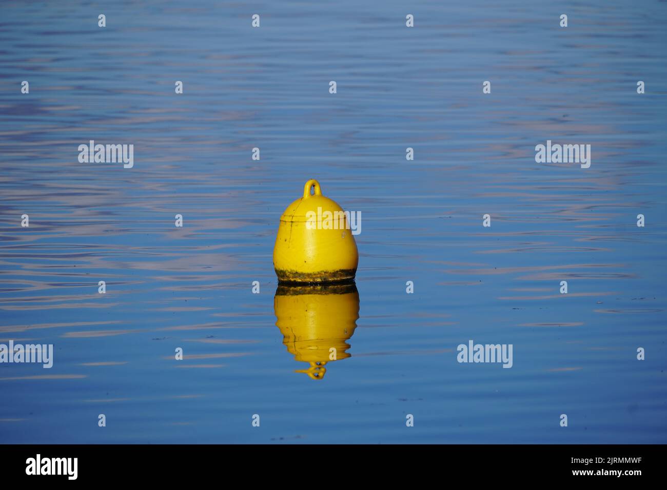 Yellow and blue buoy hi-res stock photography and images - Alamy
