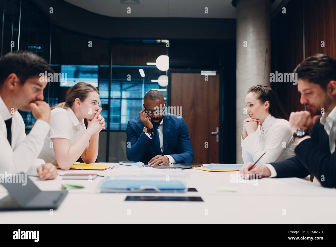 Sad Businessman and businesswoman team at office meeting. Business ...