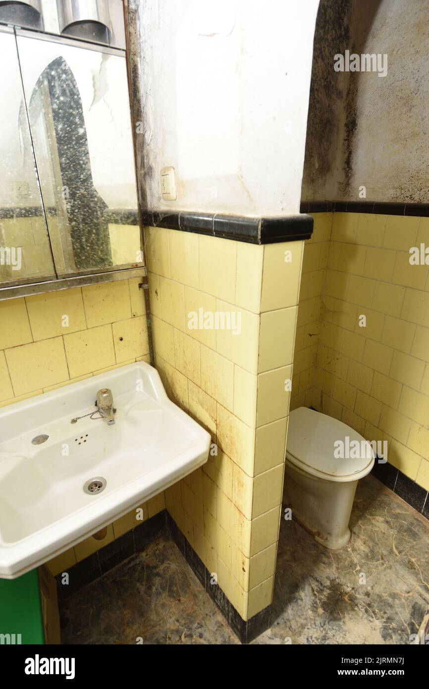 old bathroom in a building Stock Photo - Alamy