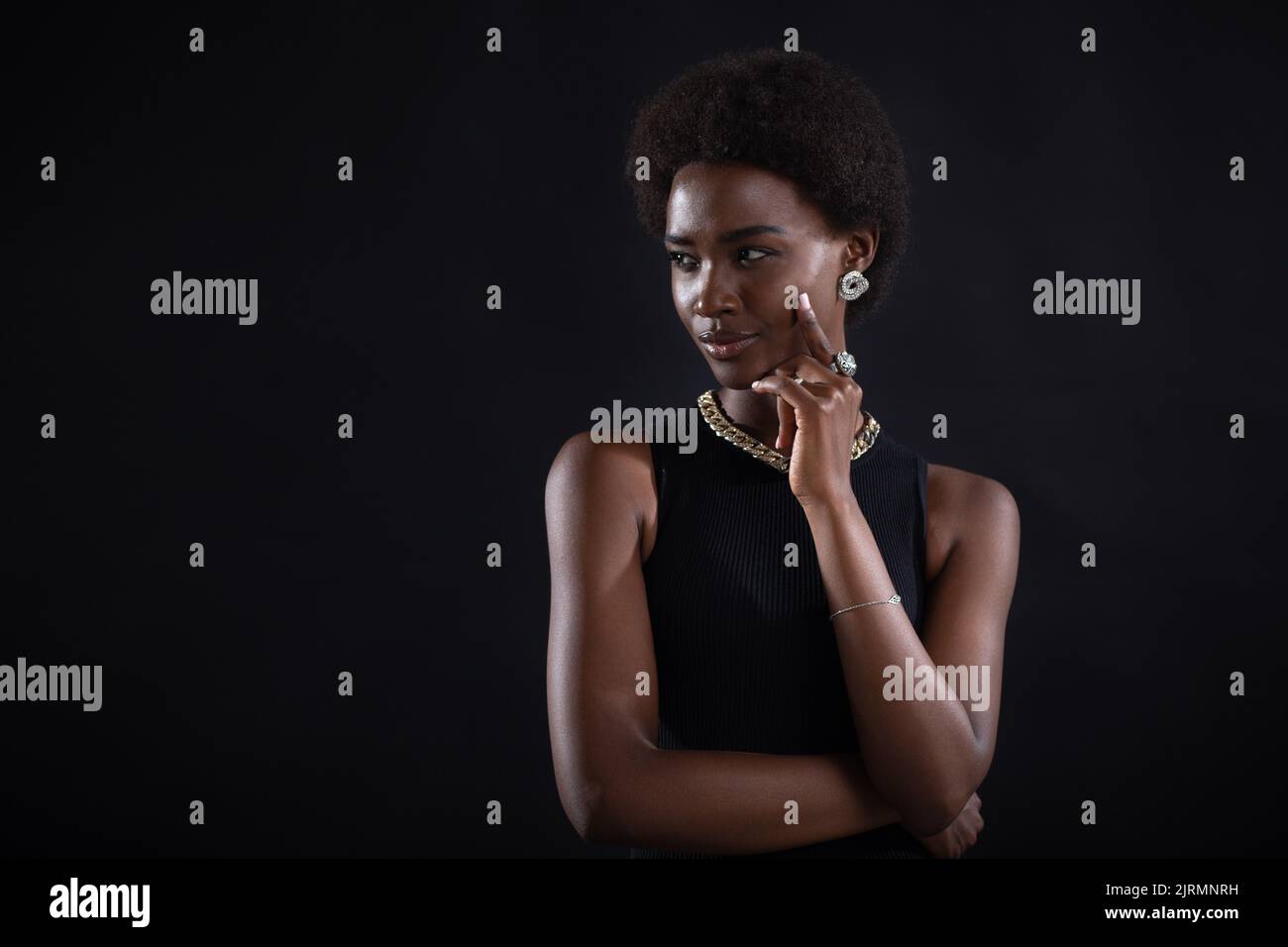 Young black woman trying to find best solution and searching answer ...