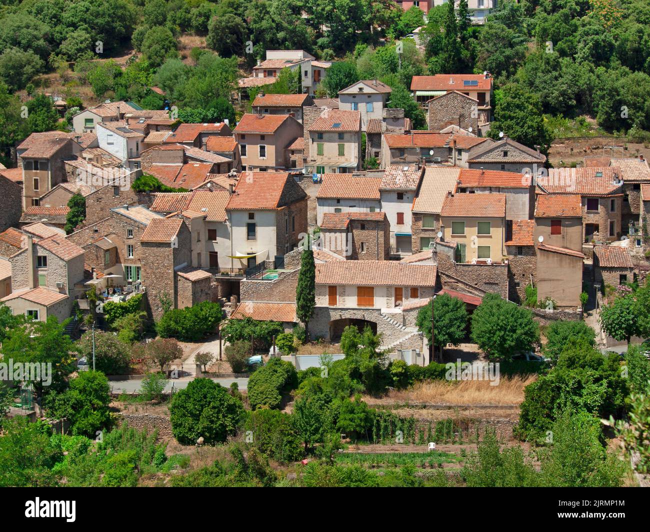 The village of Ceps, on the River Orb in southern France Stock Photo ...
