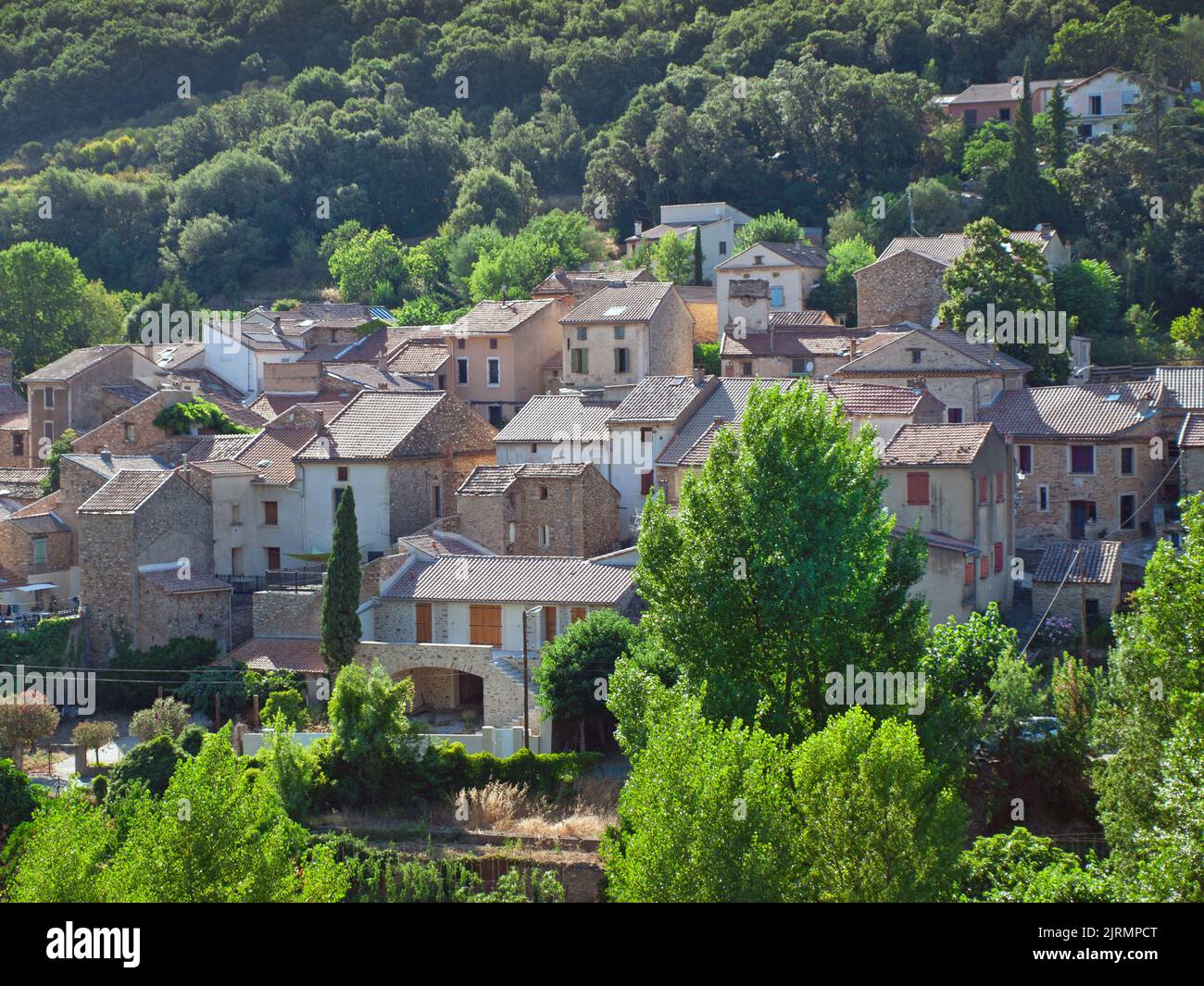 The village of Ceps, on the River Orb in southern France Stock Photo ...
