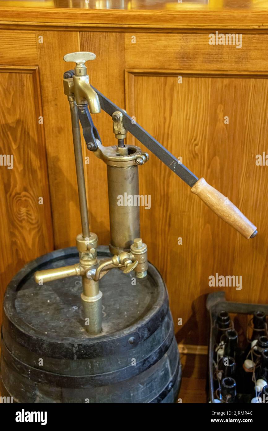 Retro beer barrel with old tap mechanism in a pub Stock Photo - Alamy
