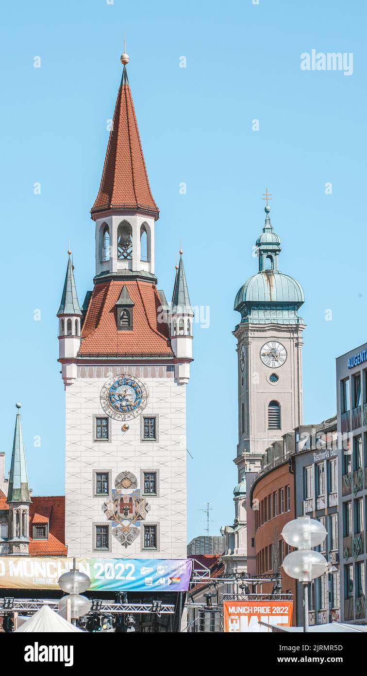 The vertical view of the old town hall building under the blue sky in ...