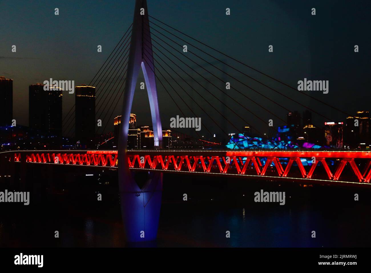 A scenic view of the architecture of Chongqing and the bridge over the ...