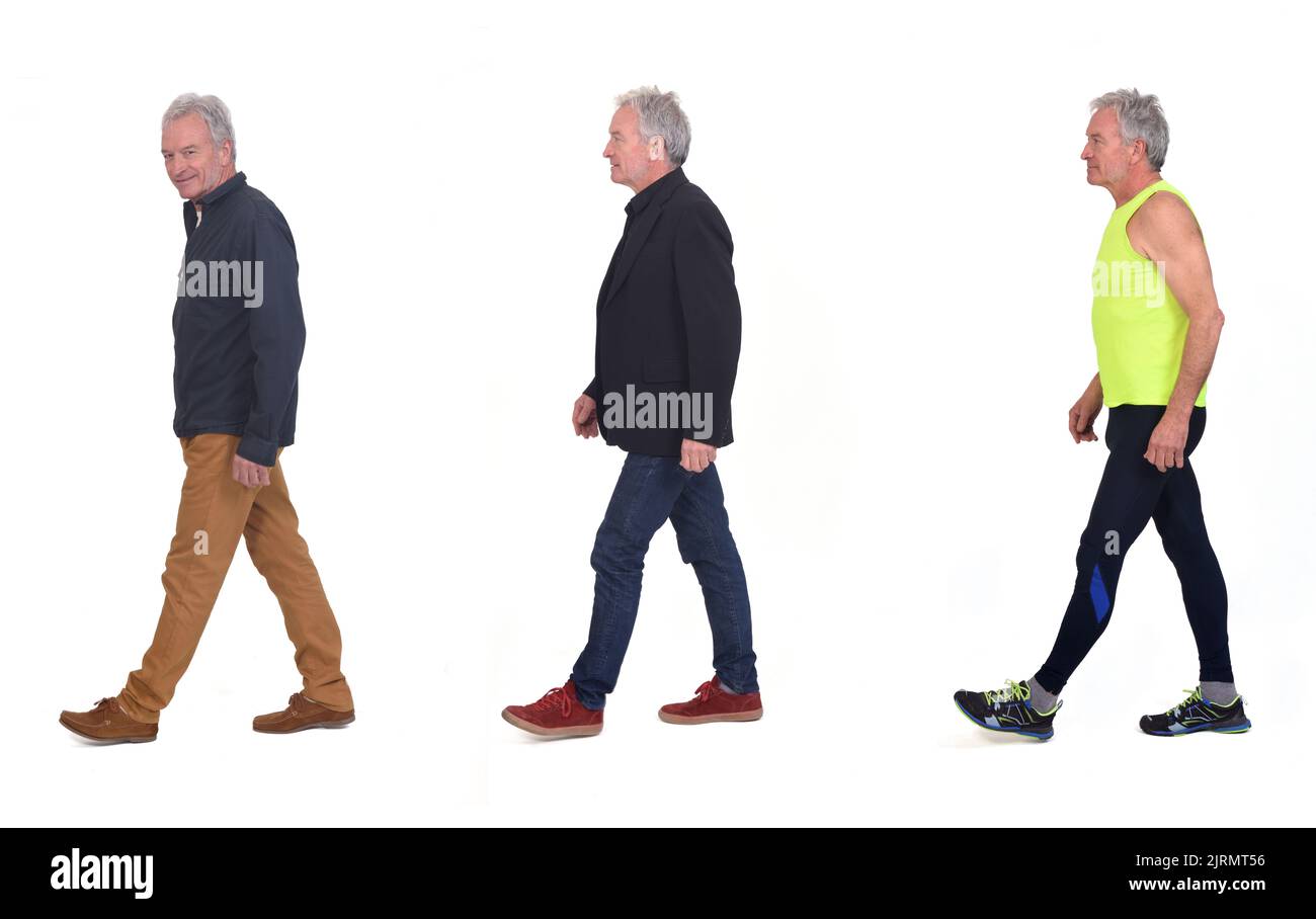 side view of same men with various outfits walking on white background ...