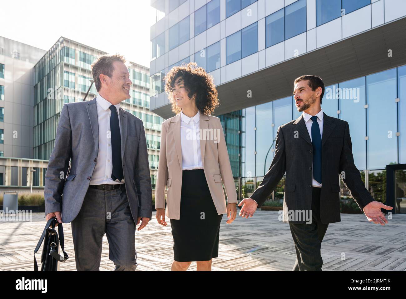 Multiracial group of business people bonding outdoors - International ...
