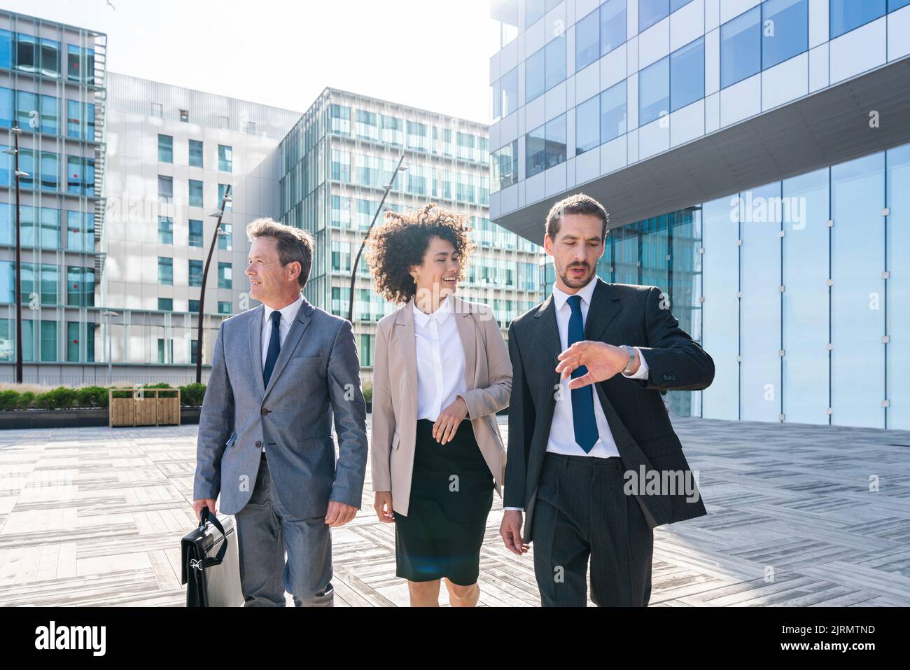 Multiracial group of business people bonding outdoors - International ...