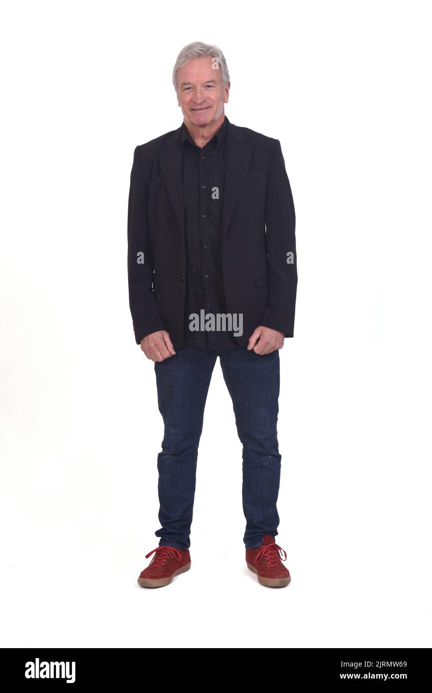 front view of man dressed in jeans sneakers and blazer on white ...