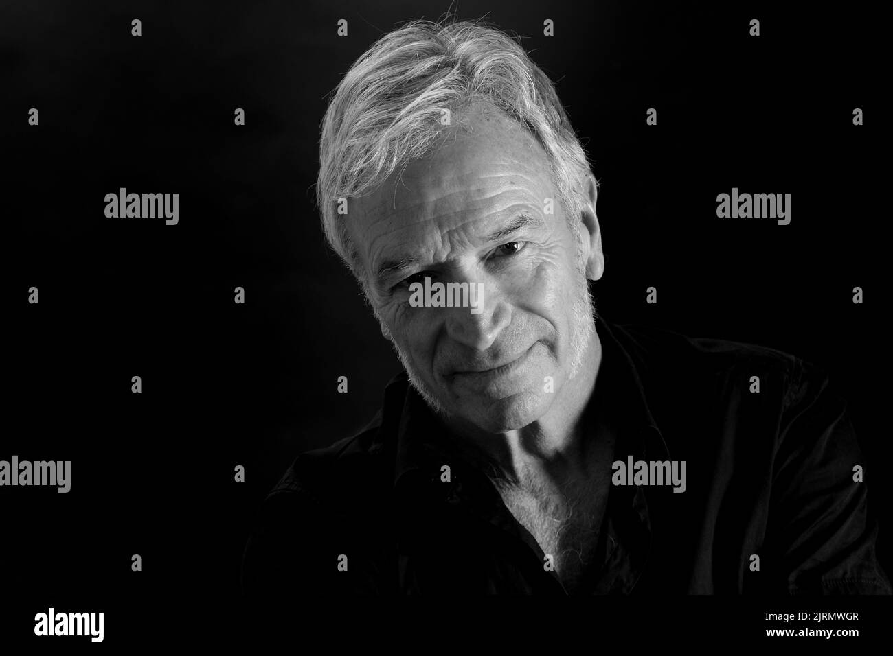 Low key portrait old man hi-res stock photography and images - Alamy