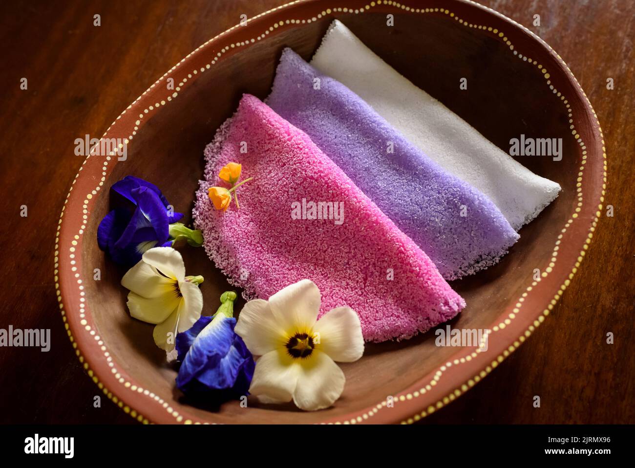 Tapioca. Colorful Brazilian tapiocas served in clay bowls with ...