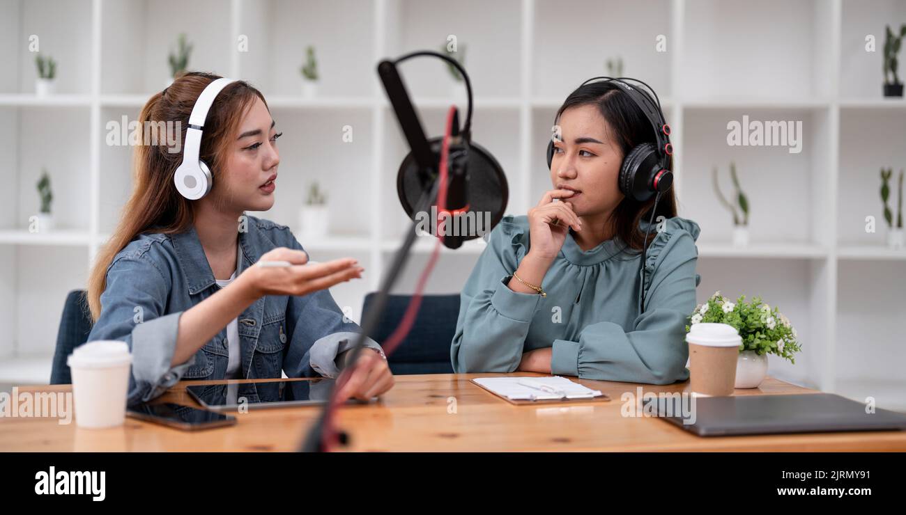 Asian dj working at radio station hi-res stock photography and images ...