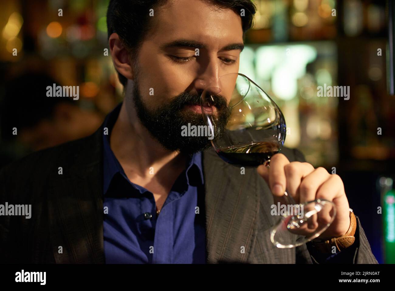 Professional sommelier tasting red wine in restaurant Stock Photo - Alamy